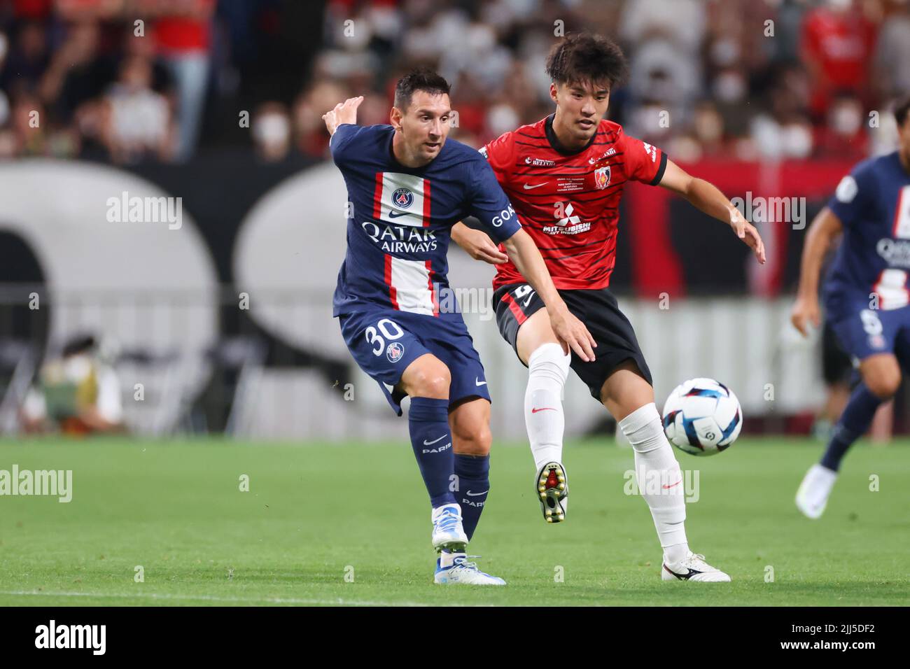 Saitama, Japan. 23rd July, 2022. (L to R) Lionel Messi (PSG), Yuichi ...