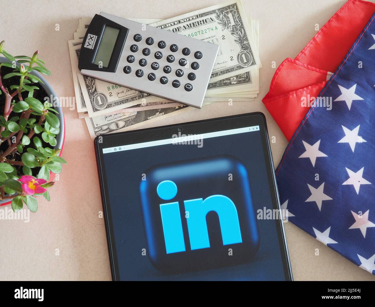 In this photo illustration, LinkedIn logo seen displayed on a tablet ...