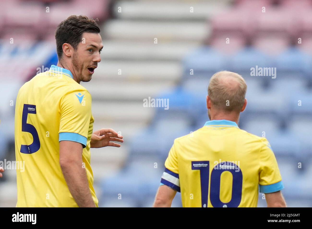 Ben Heneghan #5 of Sheffield Wednesday celebrates with Barry Bannan #10 ...