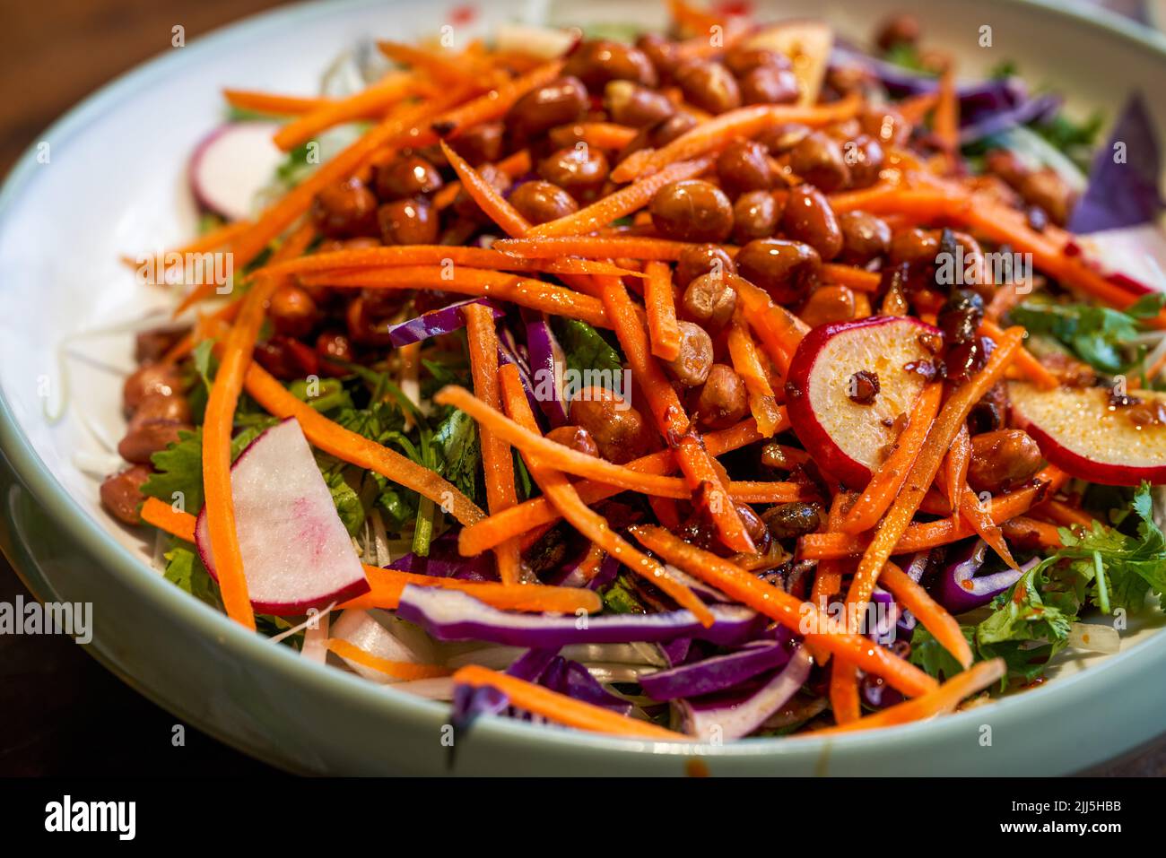 A spicy and delicious Northeast cold dish, tiger dish Stock Photo - Alamy