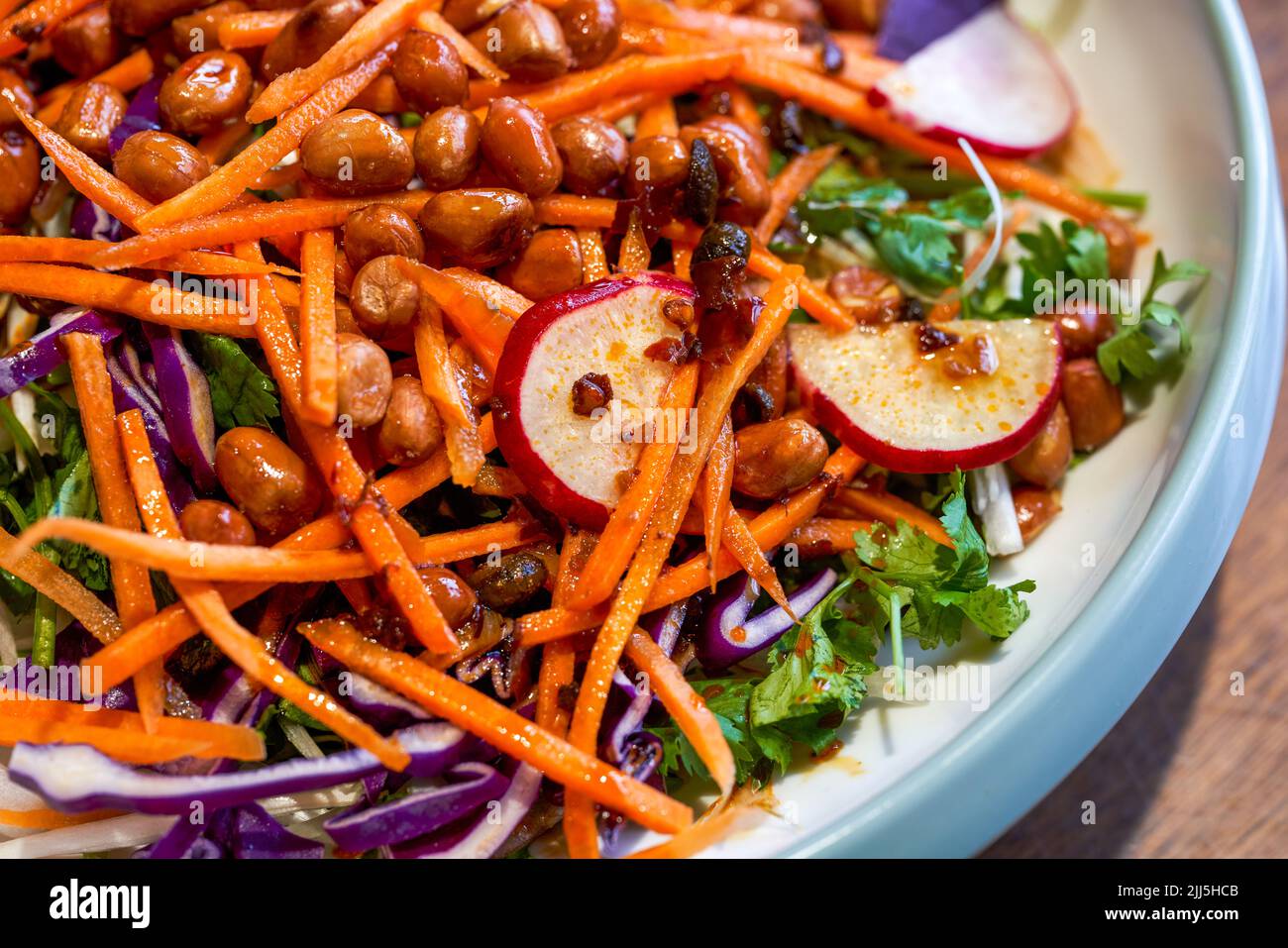 A spicy and delicious Northeast cold dish, tiger dish Stock Photo - Alamy