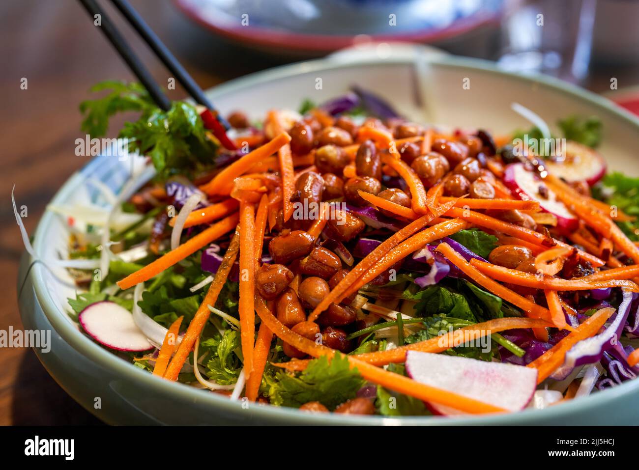 A spicy and delicious Northeast cold dish, tiger dish Stock Photo - Alamy