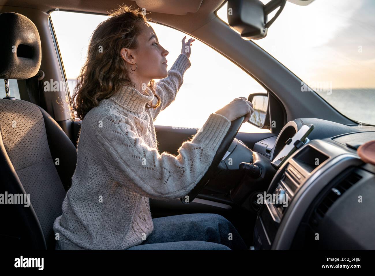 Sitting drivers seat woman hi-res stock photography and images - Alamy