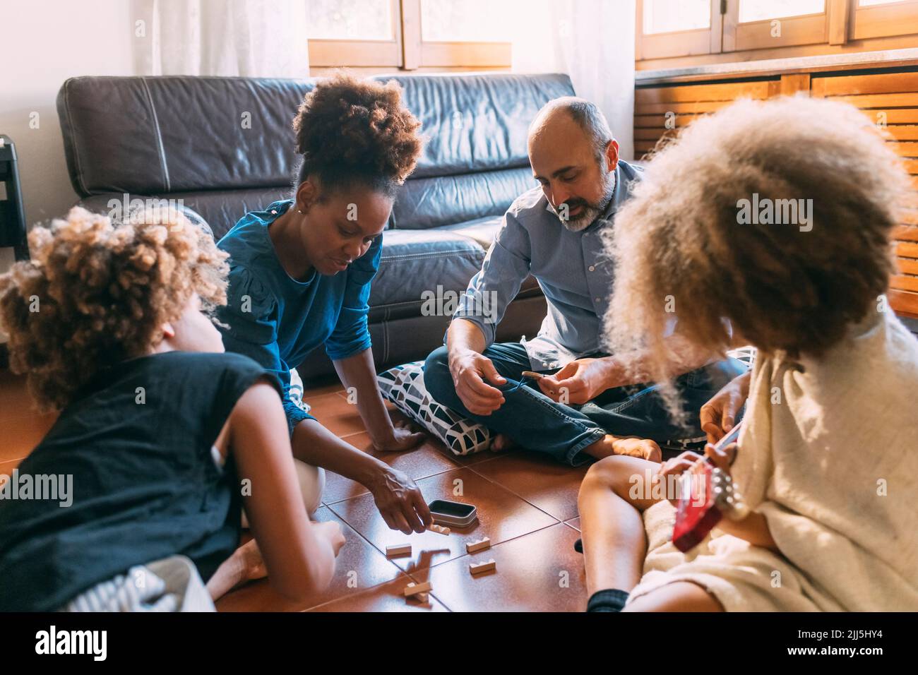 Two children playing instruments hi-res stock photography and images ...