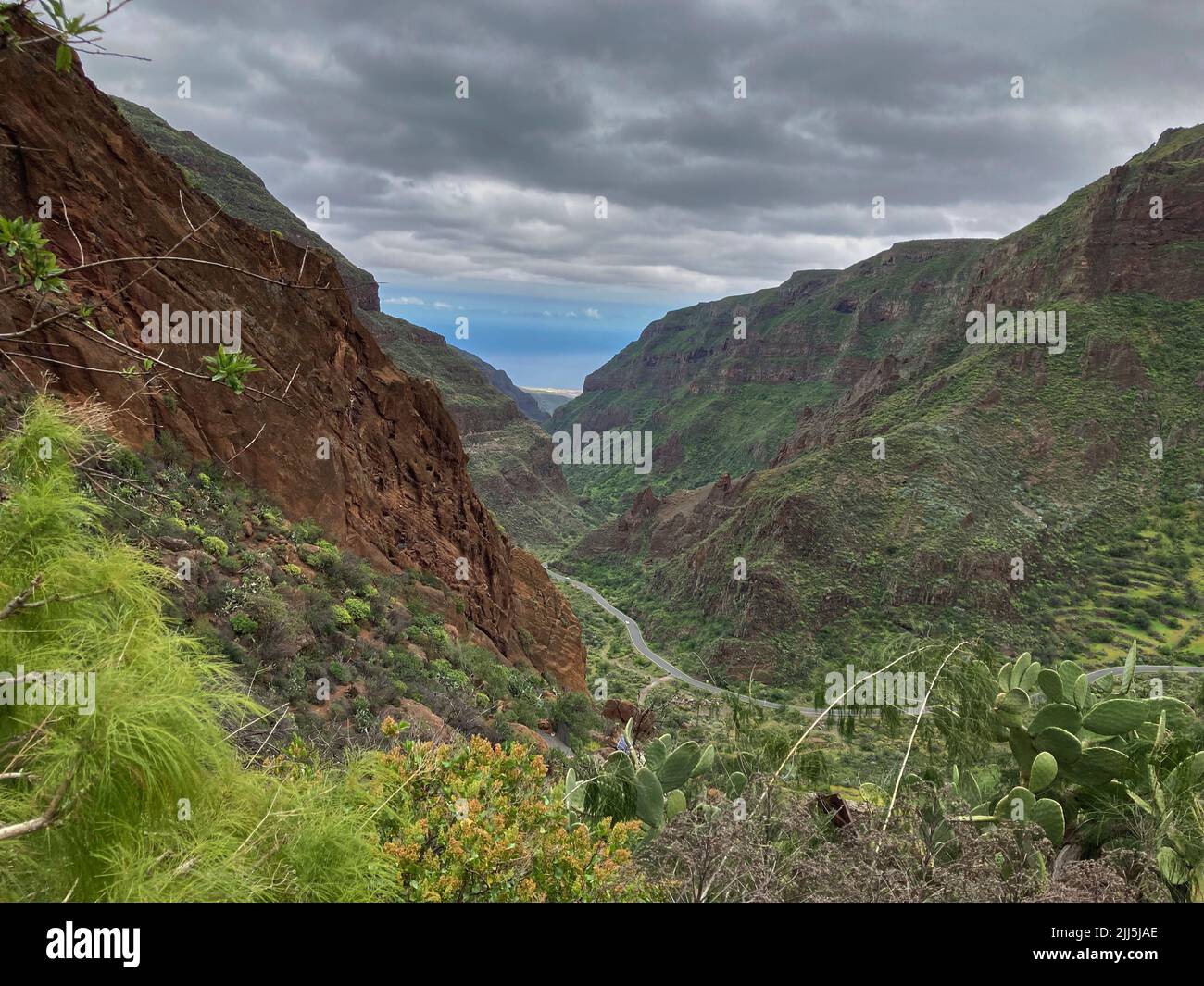 Spain, Gran Canaria, Cloudy sky over Guayadeque Ravine in summer Stock ...
