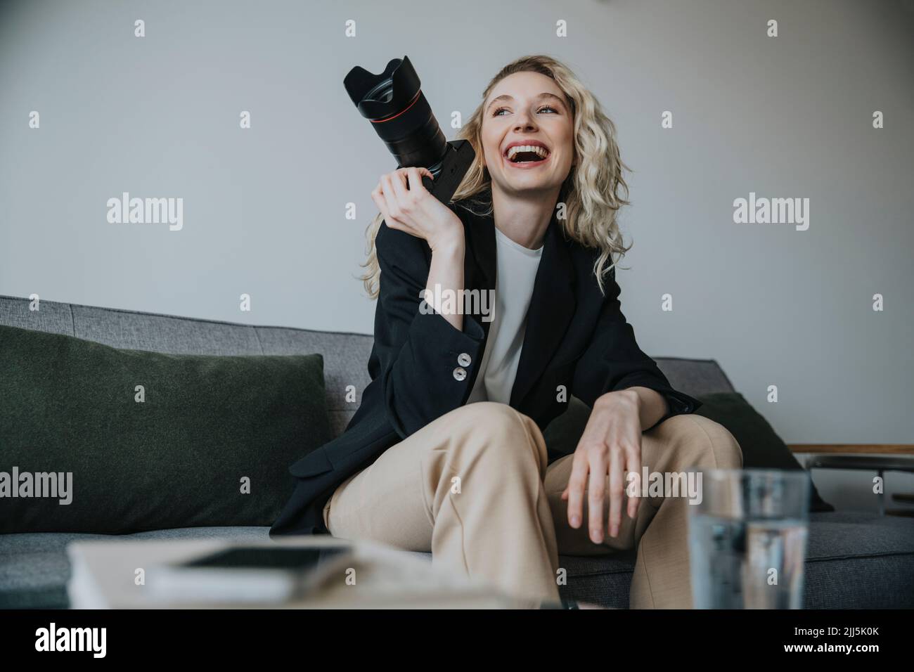 Seated camera photographer hi-res stock photography and images - Alamy