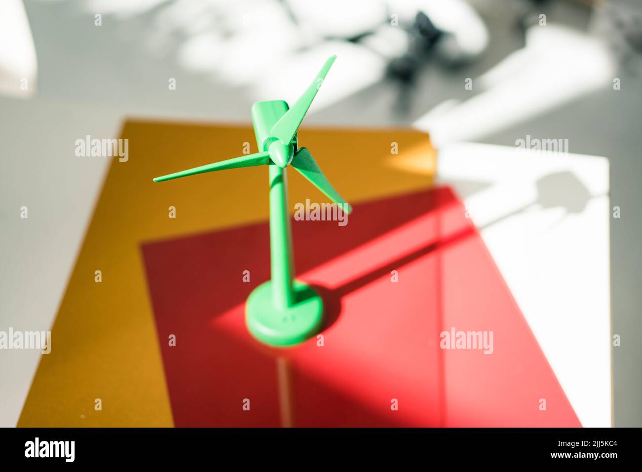 Wind turbine model on desk at office Stock Photo - Alamy