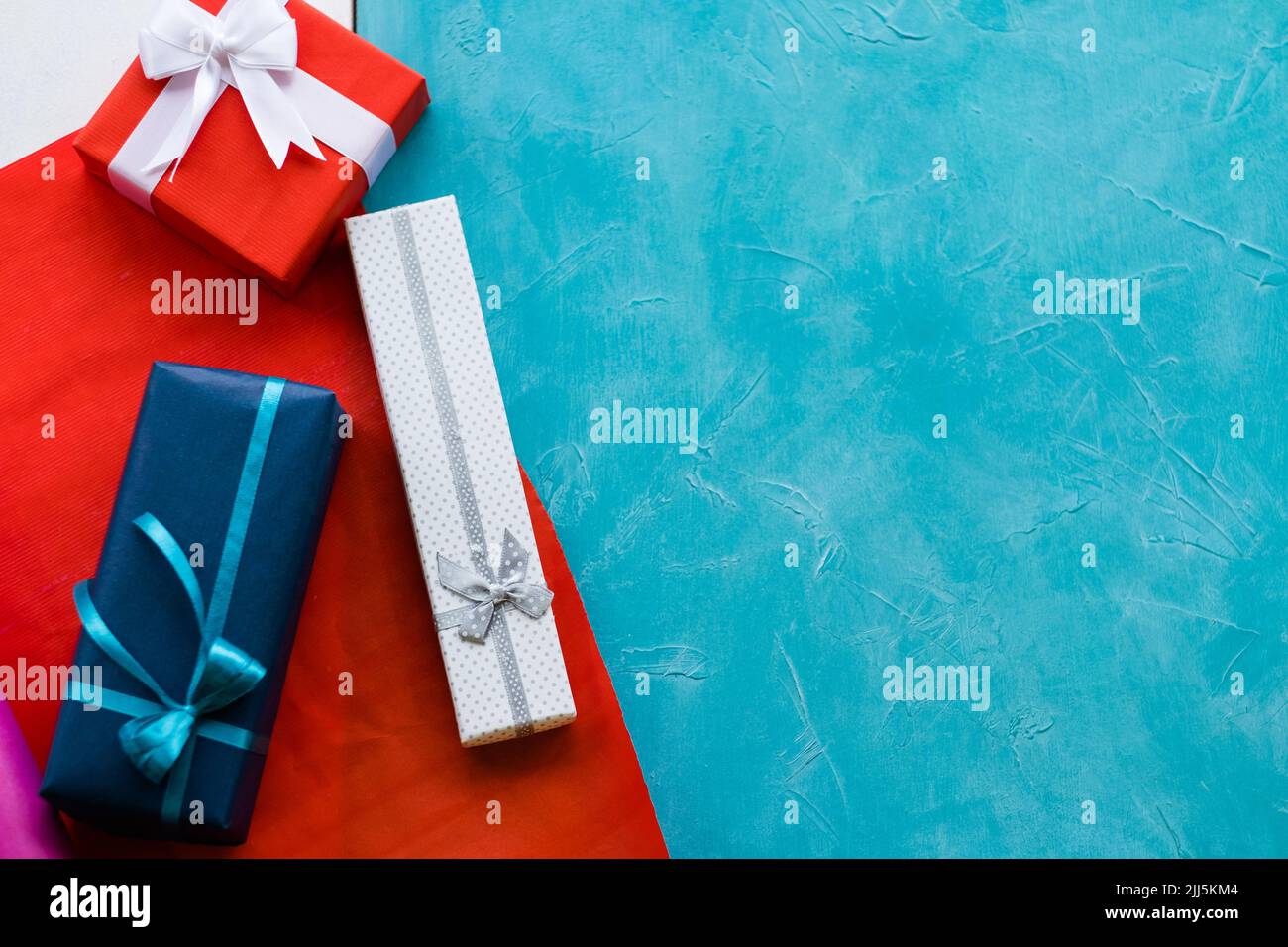 gift assortment on bright blue background Stock Photo - Alamy