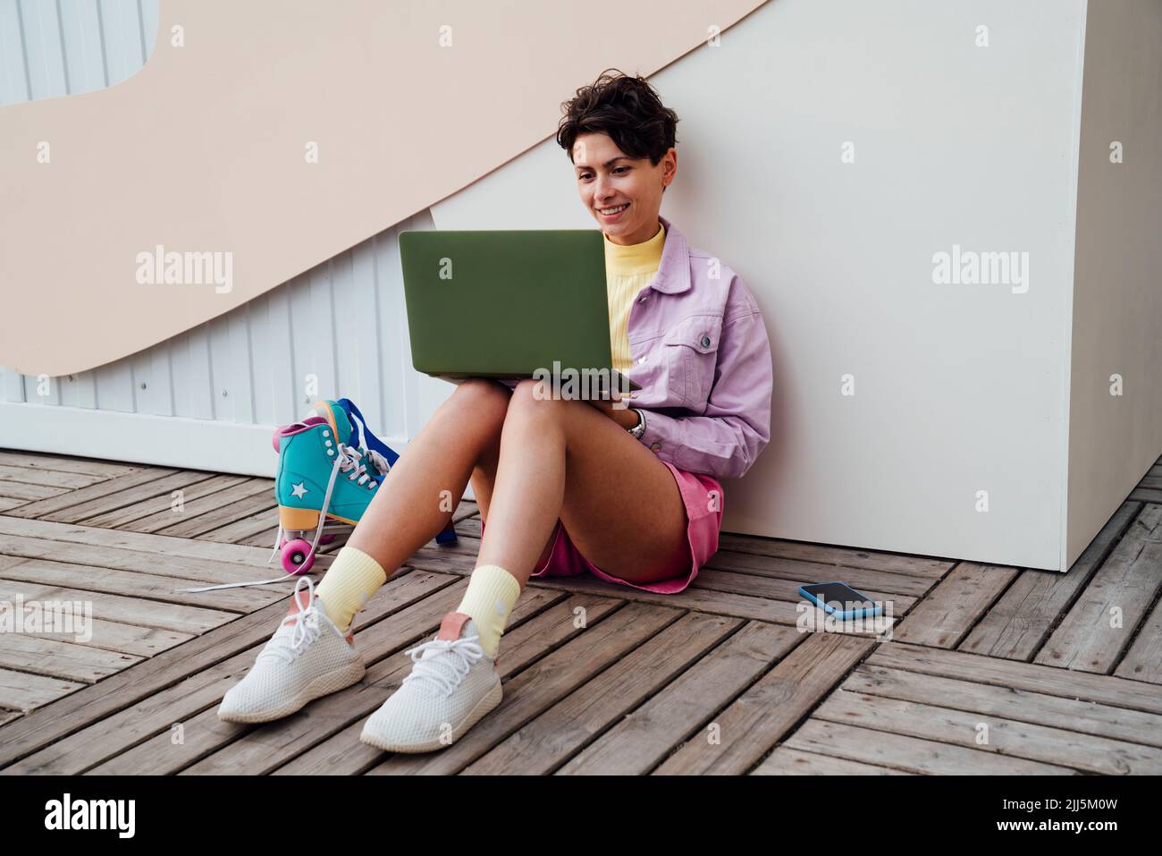 Woman exercises using laptop hi-res stock photography and images - Alamy