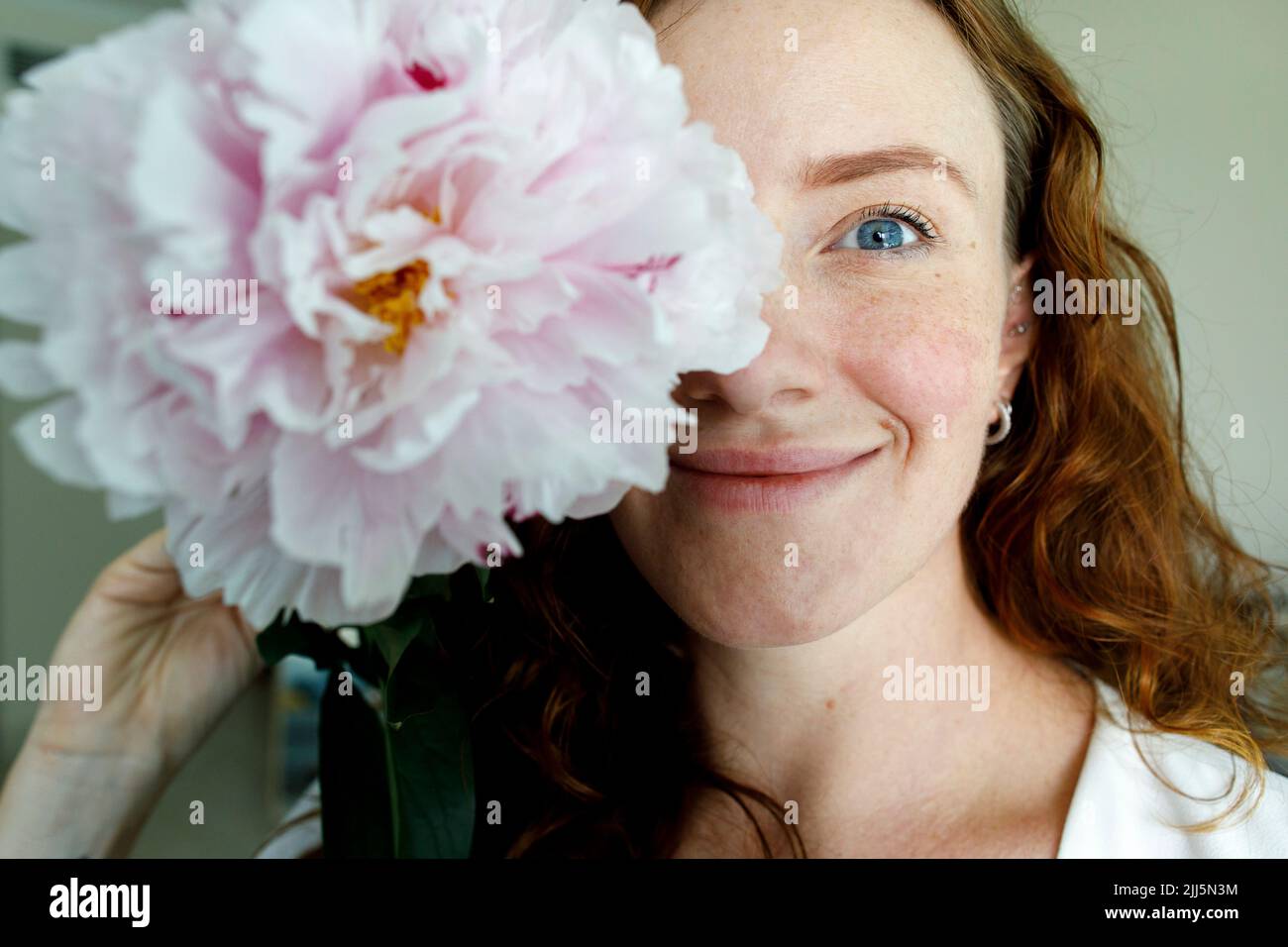 Woman face hidden flowers hi-res stock photography and images - Alamy