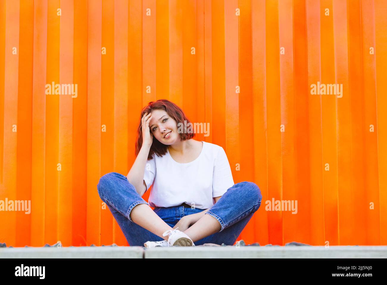Girl sitting container hi-res stock photography and images - Alamy