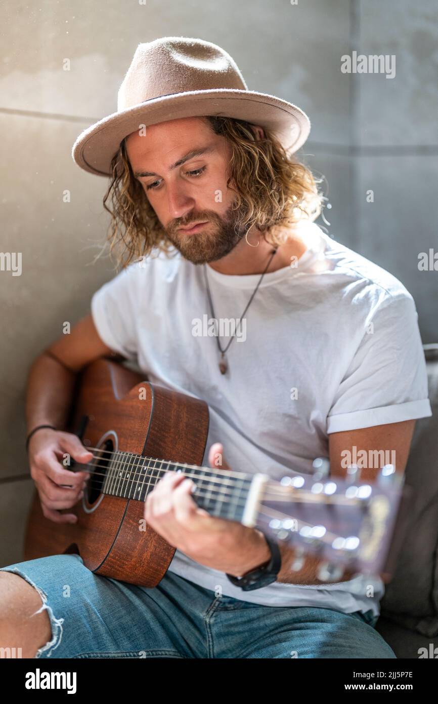 Guitarist plucking hi-res stock photography and images - Alamy