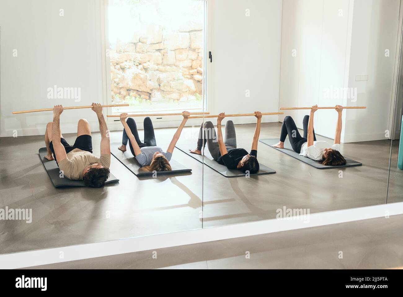 Four women yoga in studio hi-res stock photography and images - Alamy