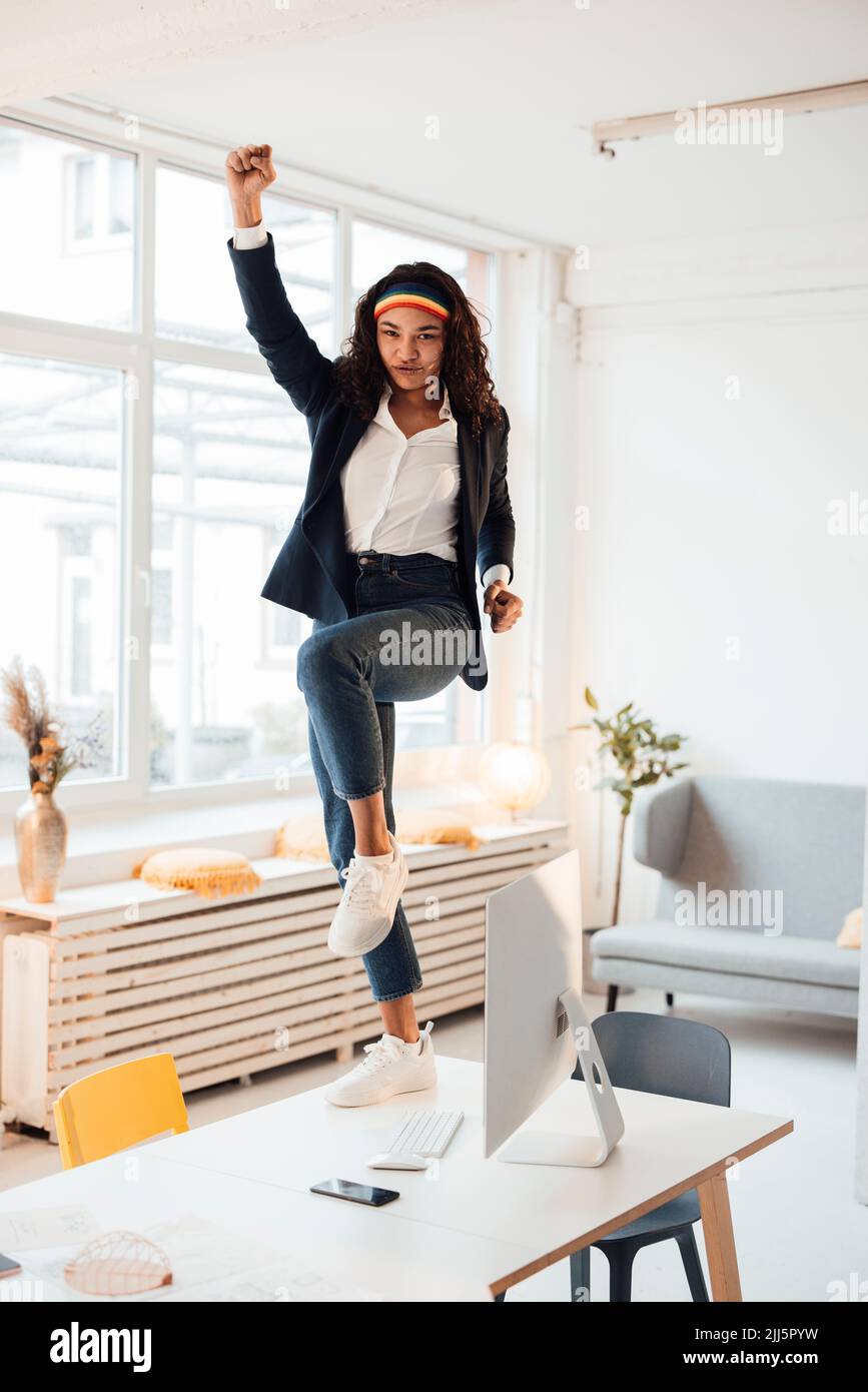 Woman one leg on desk hi-res stock photography and images - Alamy