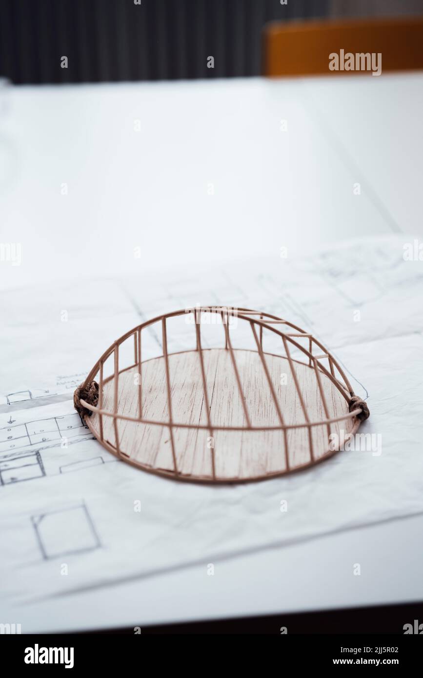 Architectural model on blueprint in office Stock Photo - Alamy