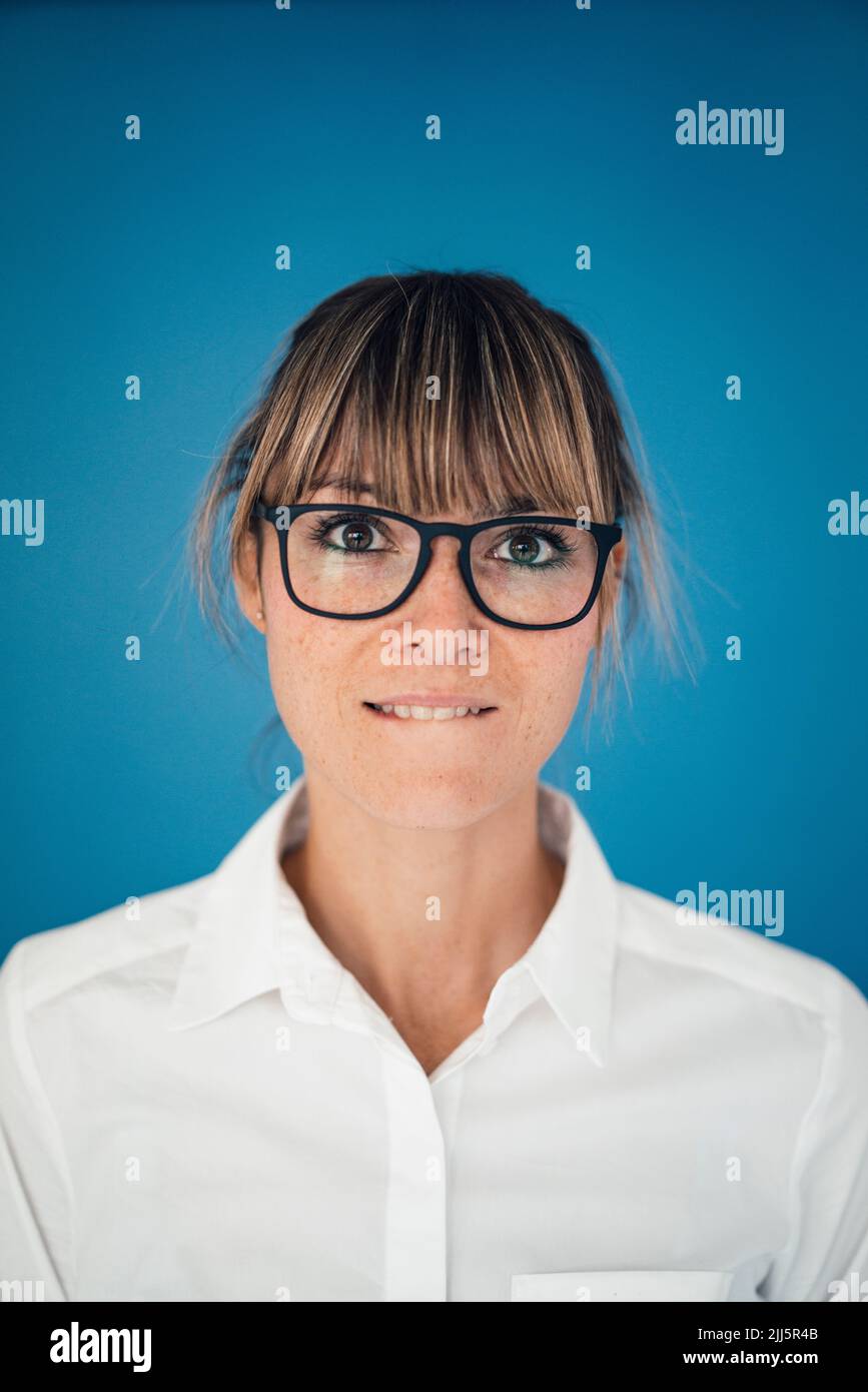 Biting lip hi-res stock photography and images - Alamy