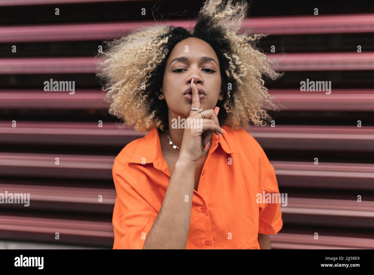 Making silence gesture hi-res stock photography and images - Alamy