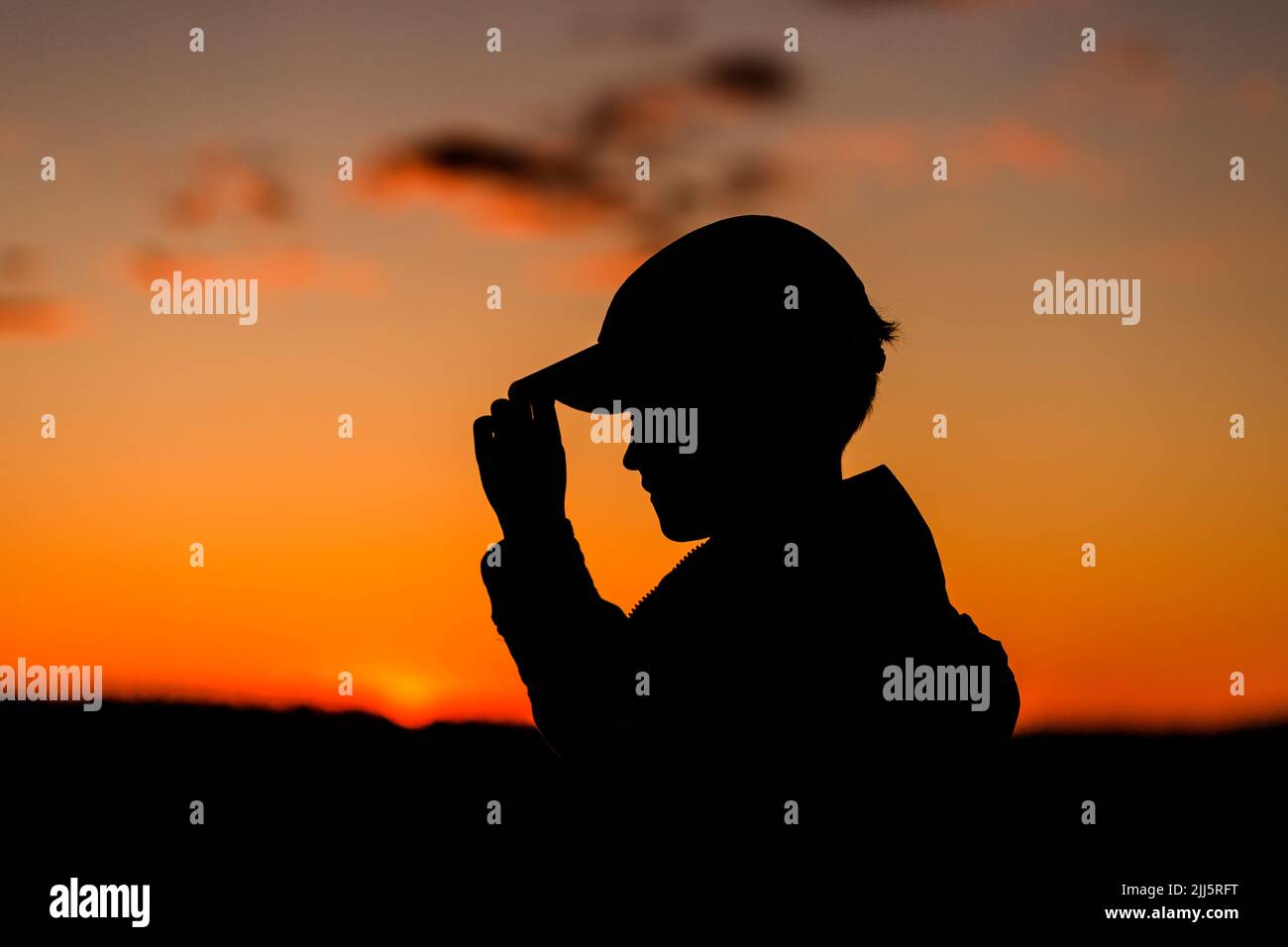 Caps silhouette hi-res stock photography and images - Alamy