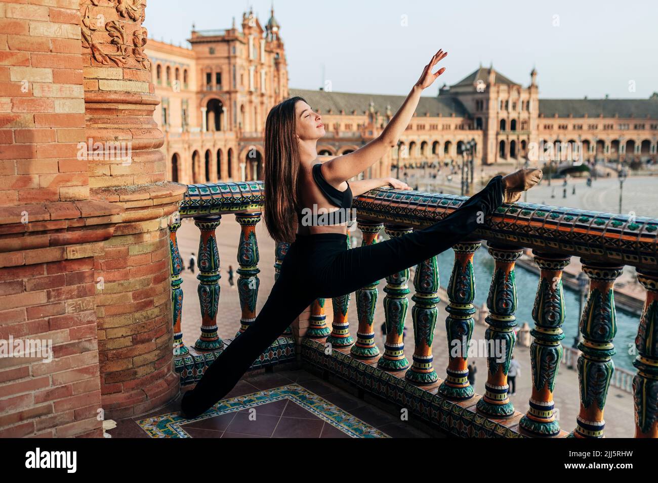 Ballet dancer dancing on historic balcony Stock Photo - Alamy
