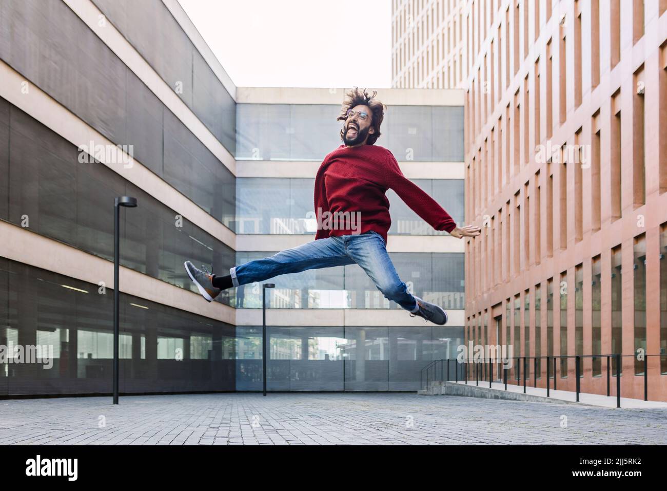 Jumping from structure hi-res stock photography and images - Alamy