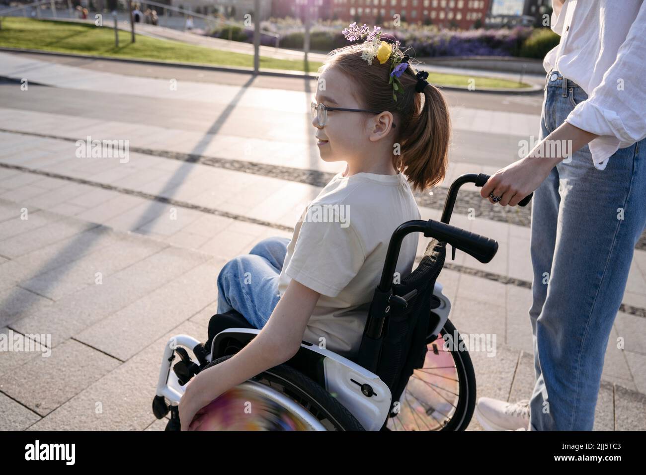 Handicapped child wheelchair girl hi-res stock photography and images ...