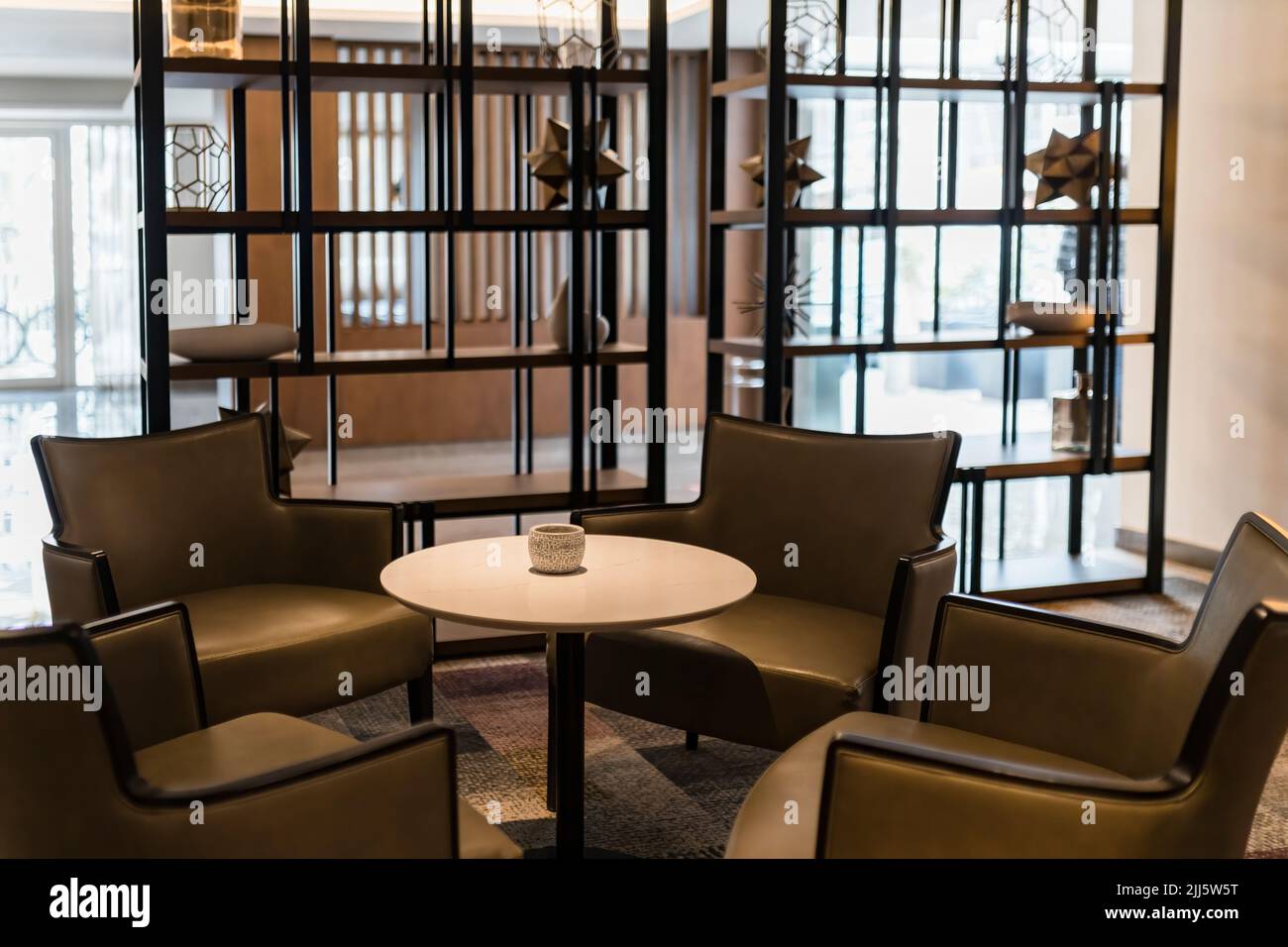 Empty armchairs in hotel lobby Stock Photo - Alamy