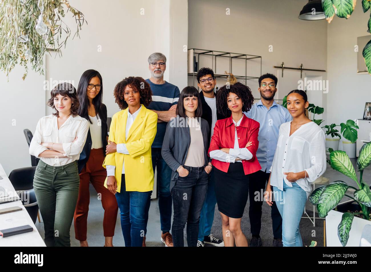 Multiracial colleagues at coworking office Stock Photo - Alamy