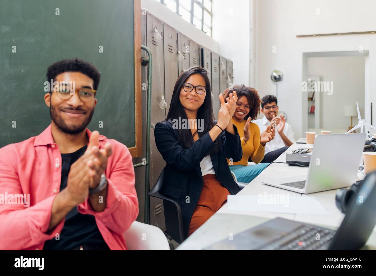 Man clapping hands seated hi-res stock photography and images - Alamy