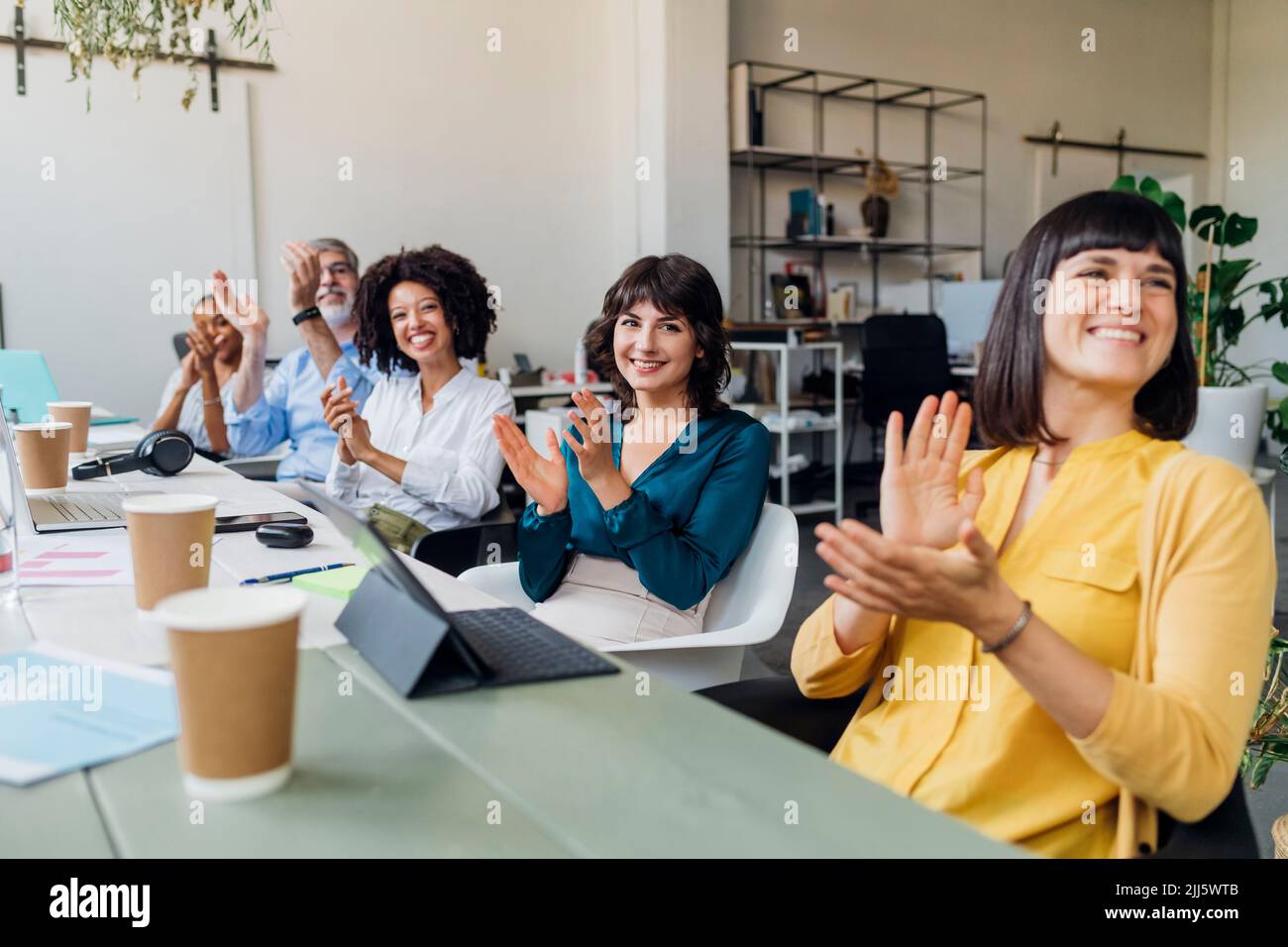 Man clapping hands seated hi-res stock photography and images - Alamy
