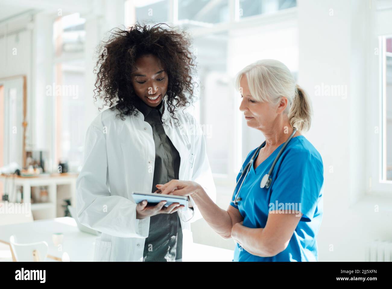 2 generations of women and computer hi-res stock photography and images ...