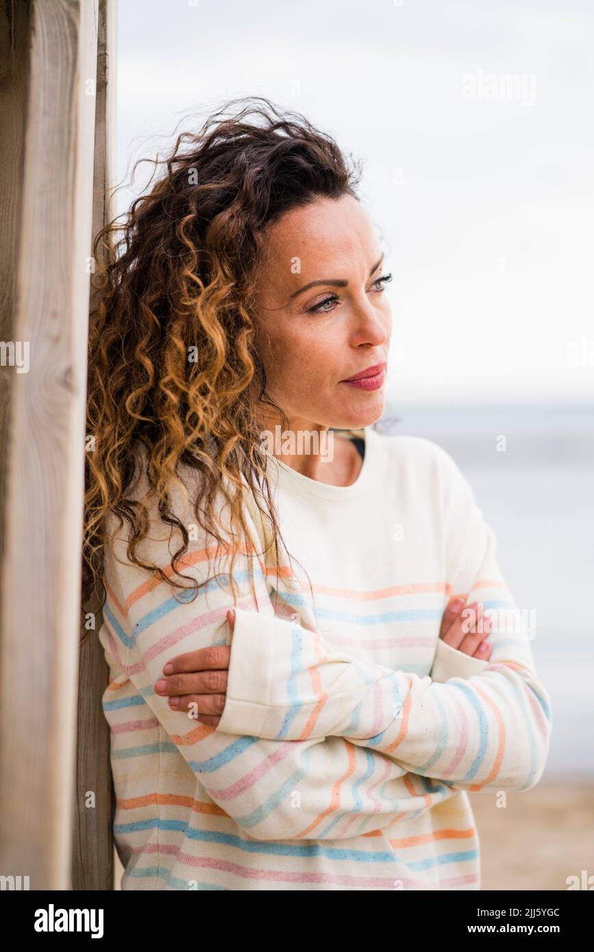 Woman arms clasped sad hi-res stock photography and images - Alamy