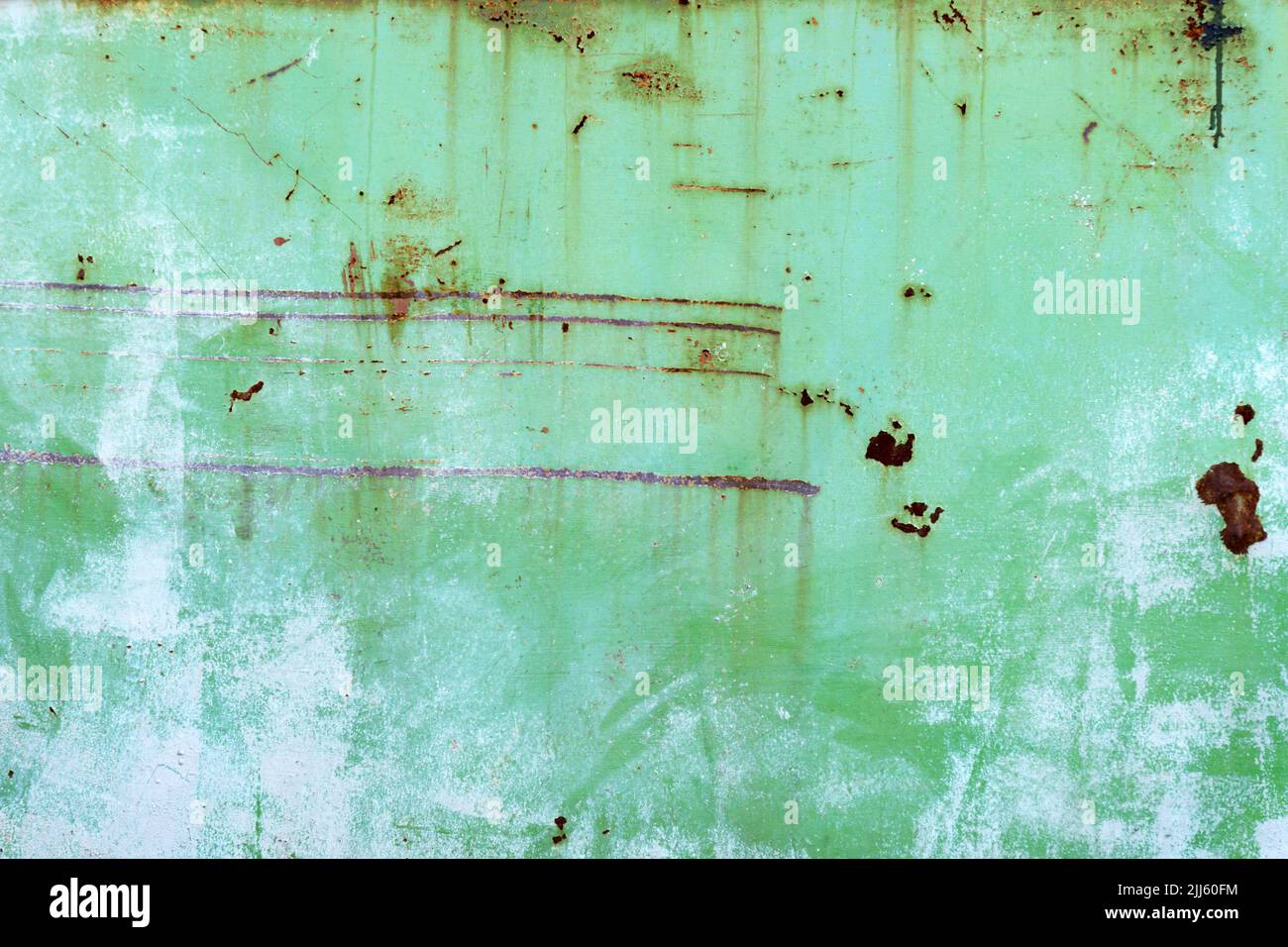 Texture of the old green paint is a rusty surface. Grunge background ...