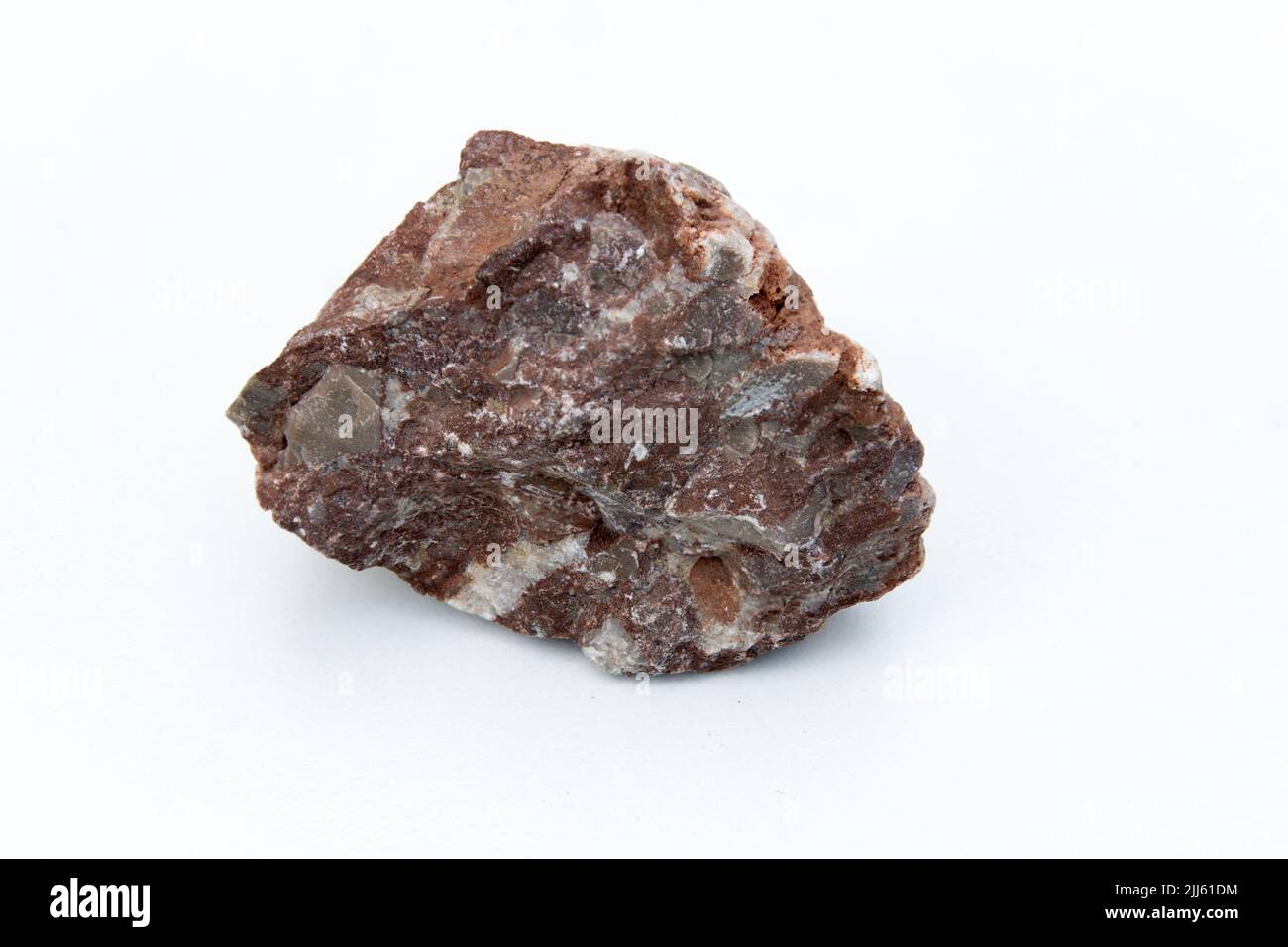 brown magmatic rock isolated over white background Stock Photo - Alamy