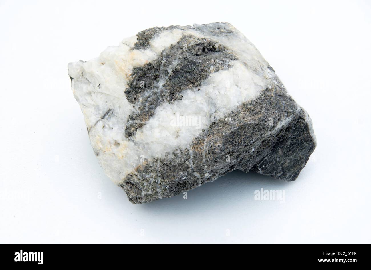 vein of quartz inside a rock isolated over white background Stock Photo ...