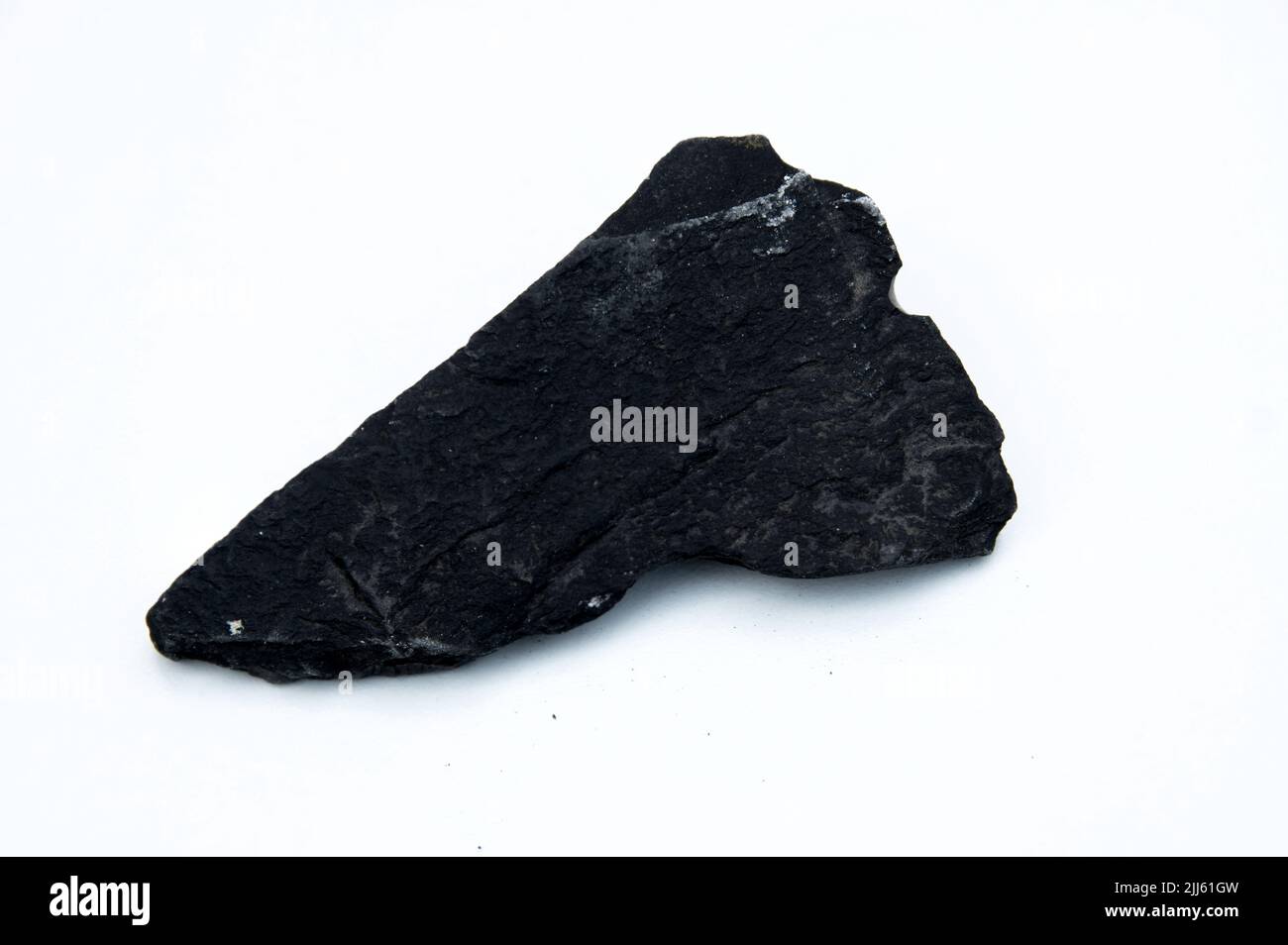 dark basalt rock isolated over white background Stock Photo - Alamy