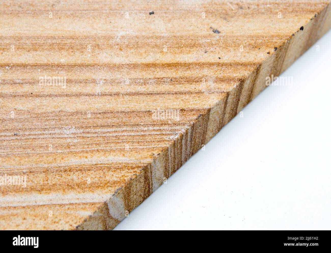 detail of sandstone isolated over white background Stock Photo - Alamy