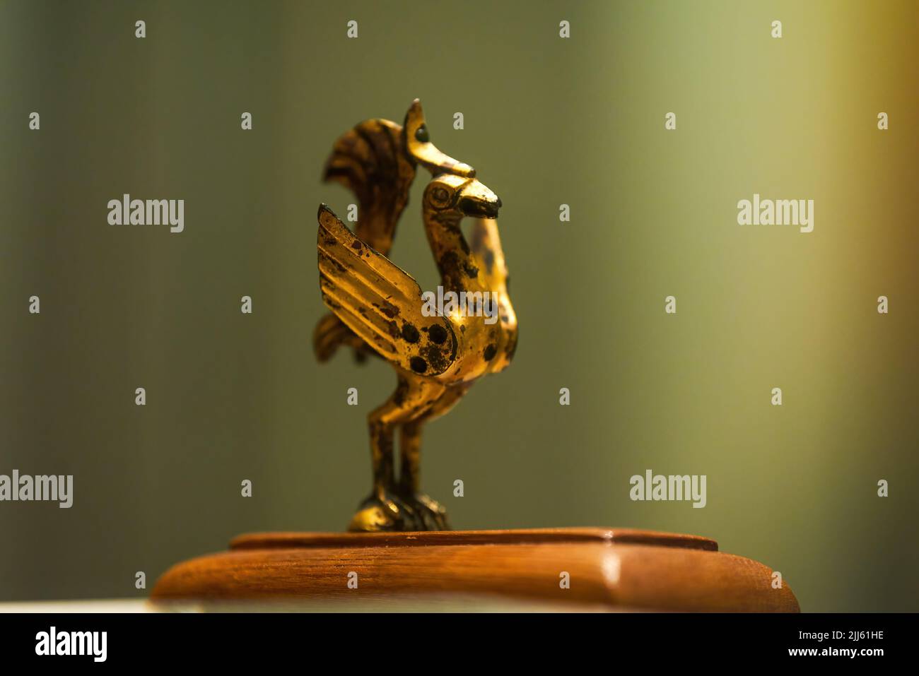 Ancient Chinese Han Dynasty artifacts in the museum, gilded rooster ...