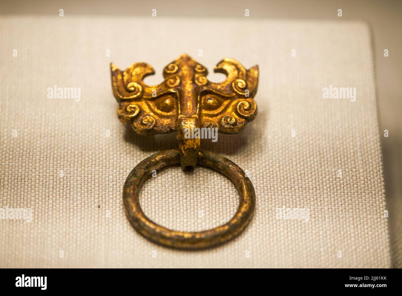 Ancient Chinese Han Dynasty cultural relics in the museum, golden ...