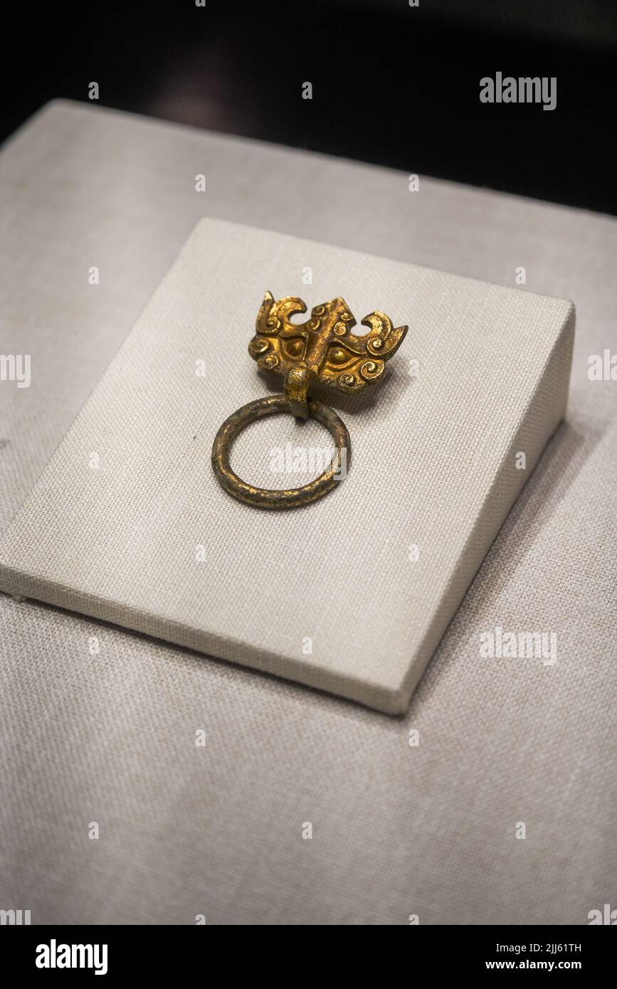 Ancient Chinese Han Dynasty cultural relics in the museum, golden ...