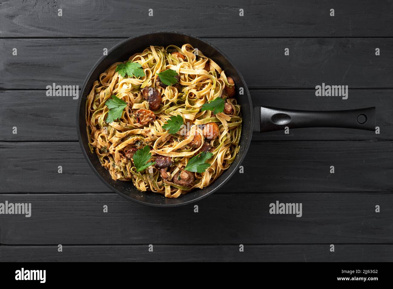 A traditional Italian and Roman dish, fettuccini pasta with spinach and ...