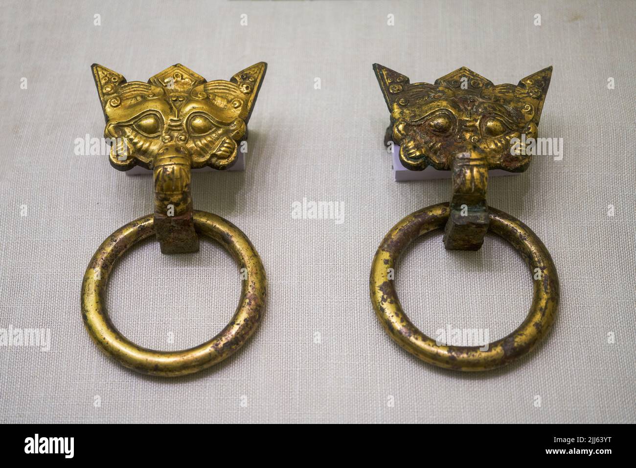 Ancient Chinese Han Dynasty cultural relics in the museum, golden ...