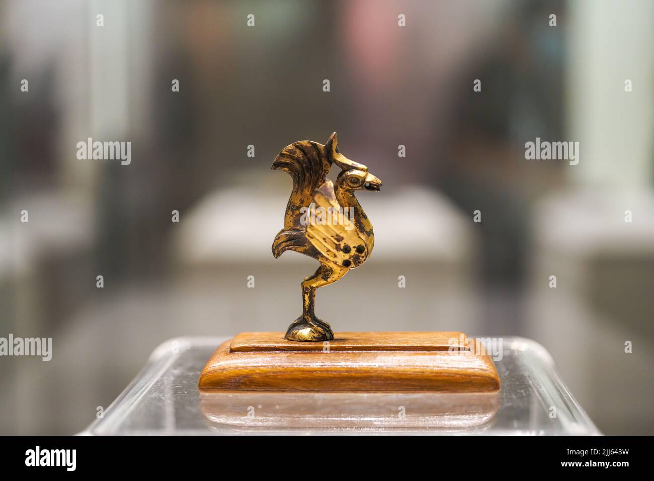 Ancient Chinese Han Dynasty artifacts in the museum, gilded rooster ...