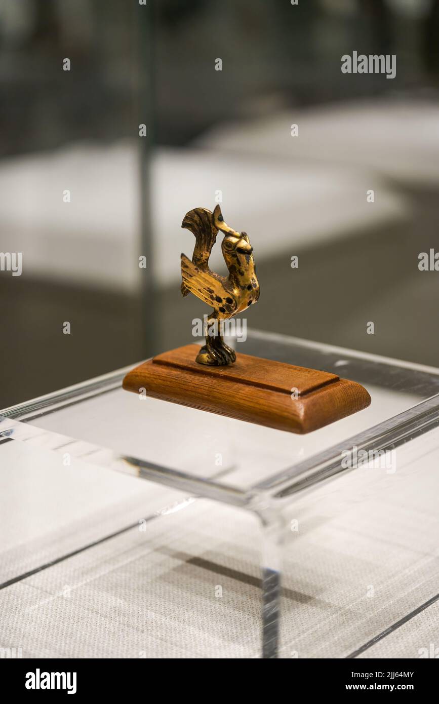 Ancient Chinese Han Dynasty artifacts in the museum, gilded rooster ...