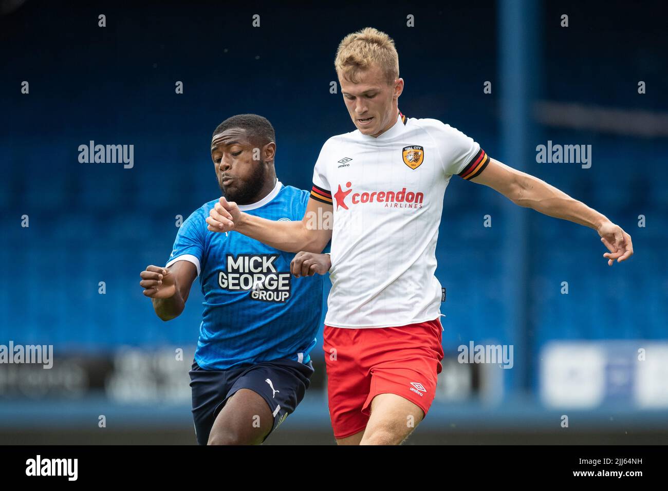 Matty Jacob #29 of Hull City and Jendo Fuchs #7 of Peterborough United ...