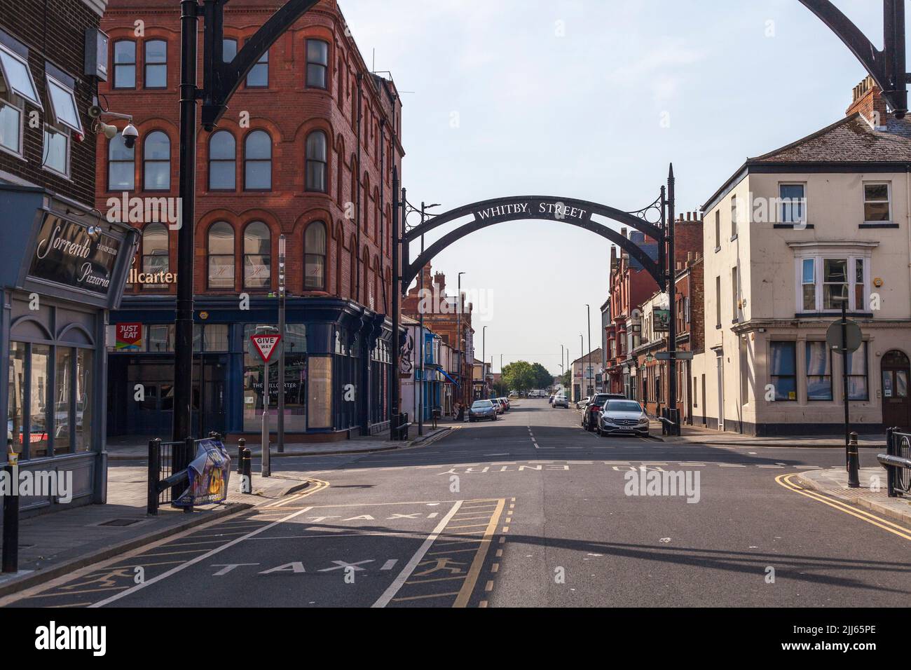 The ornate street sign above Whitby Street in Hartlepool, England, UK ...