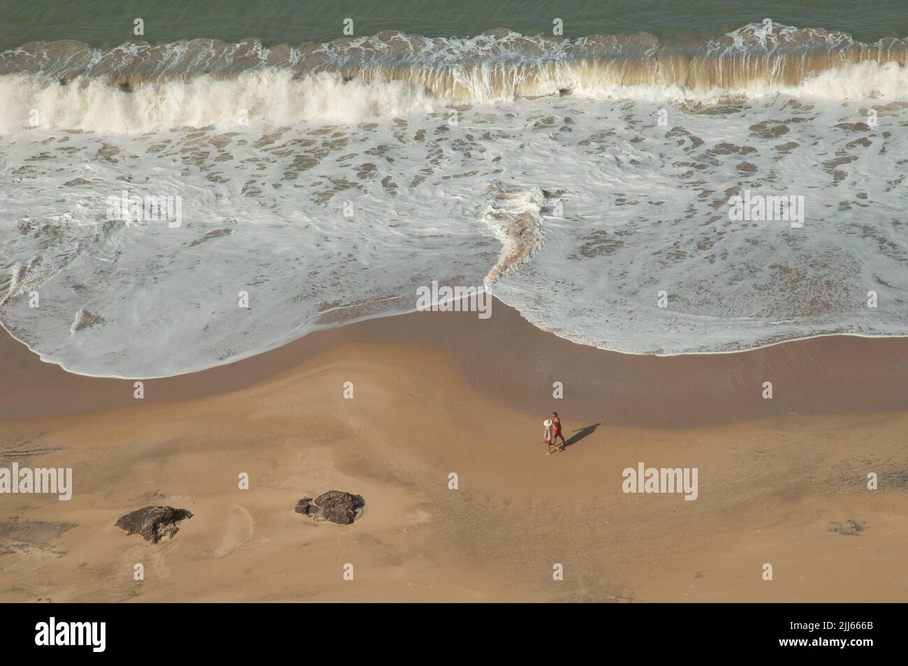 Couple walking on the beach. Natural Reserve of Popenguine. Thies ...