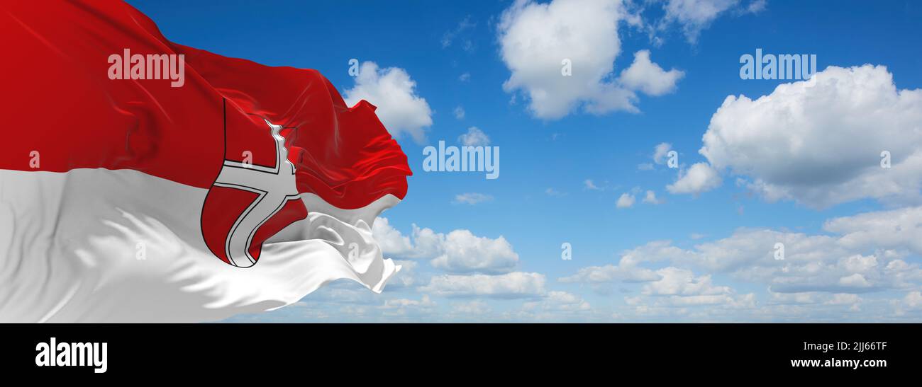 official flag of Vienna Austria at cloudy sky background on sunset ...