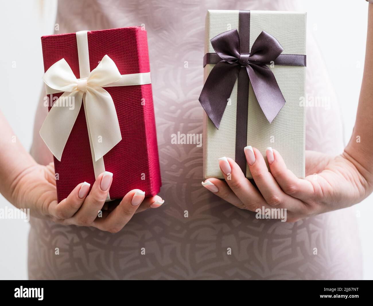 holiday present surprise woman hold gift box Stock Photo - Alamy