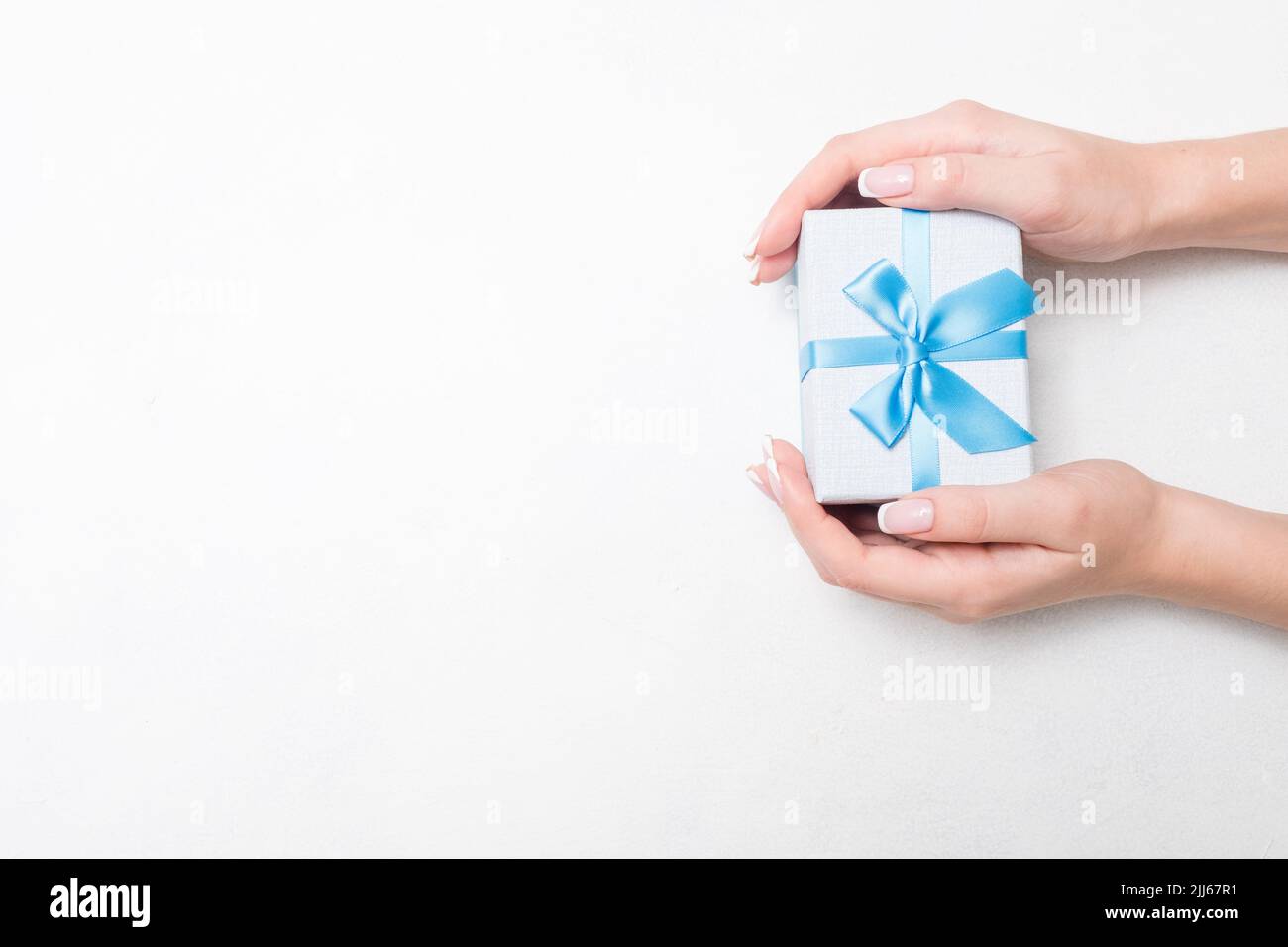 present gift bow blue reward holiday birthday Stock Photo - Alamy