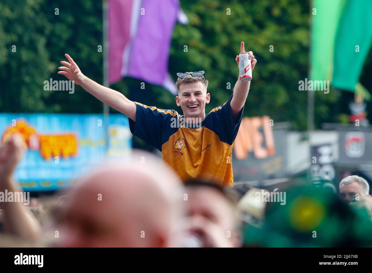 A Little Man Tate fan watches on from the crowd wearing a retro ...